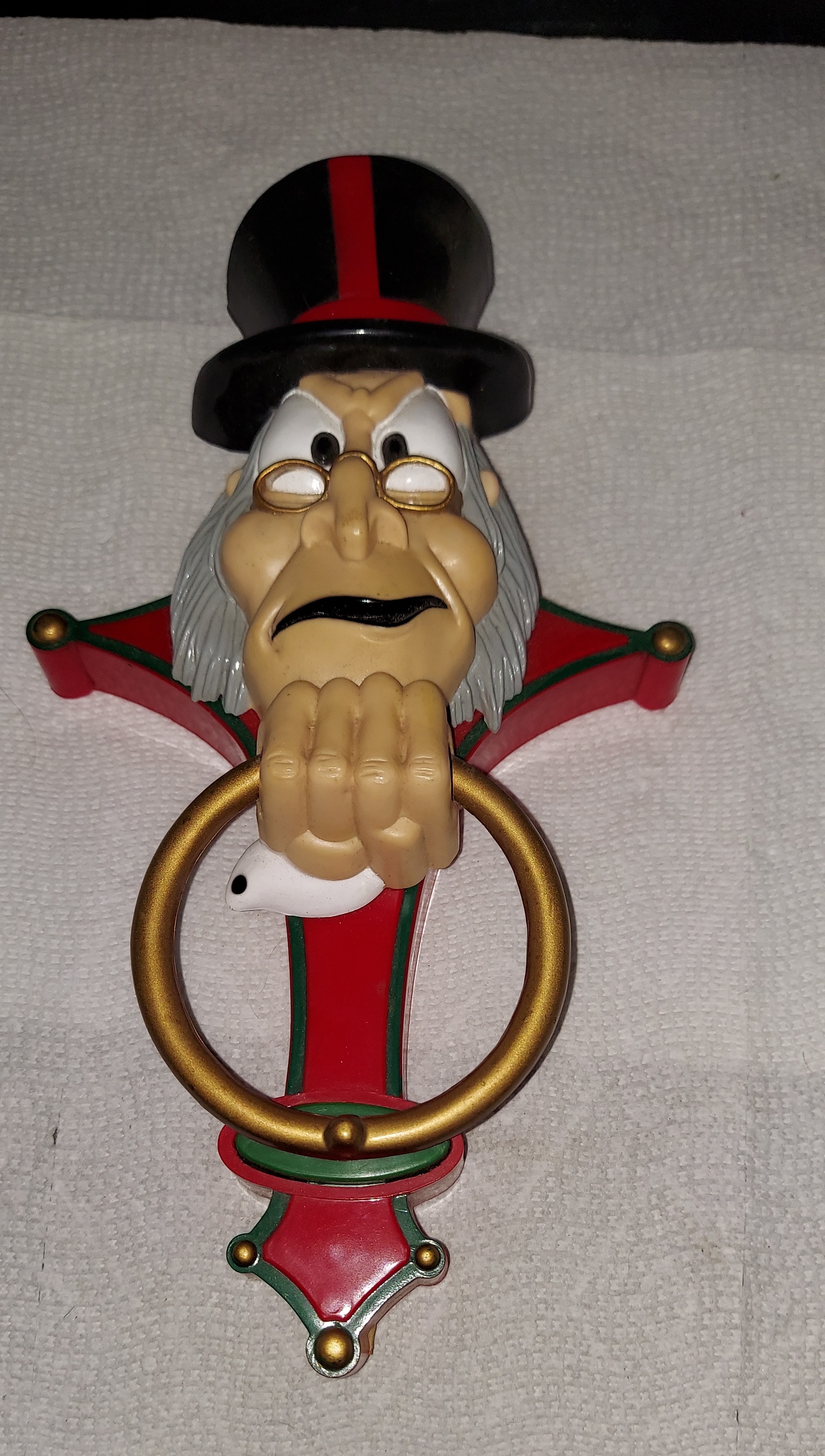 Plastic Scrooge DoorKnocker #1142 | Auctionninja.com