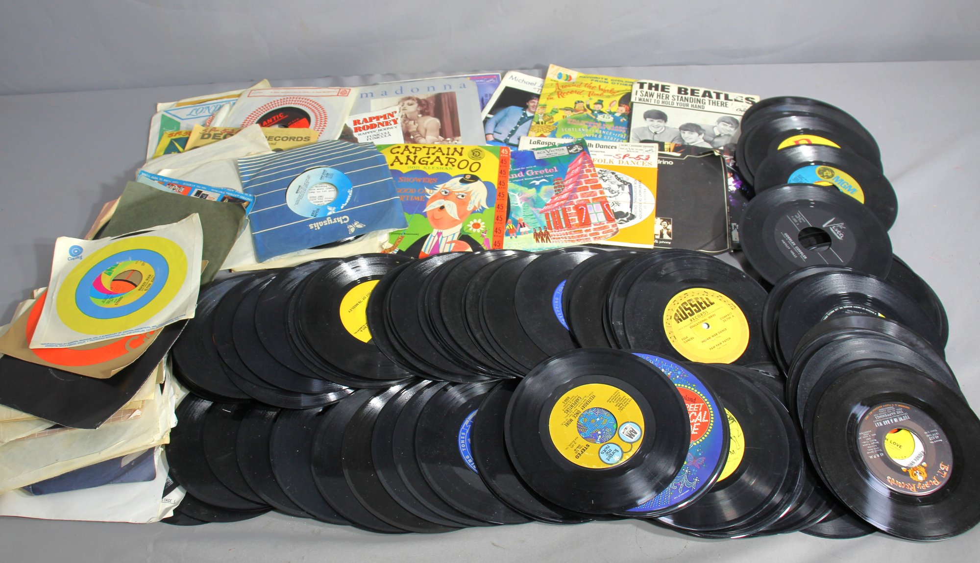 Eclectic Mix Of Vintage 45 RPM Records - Various Artists And Genres ...