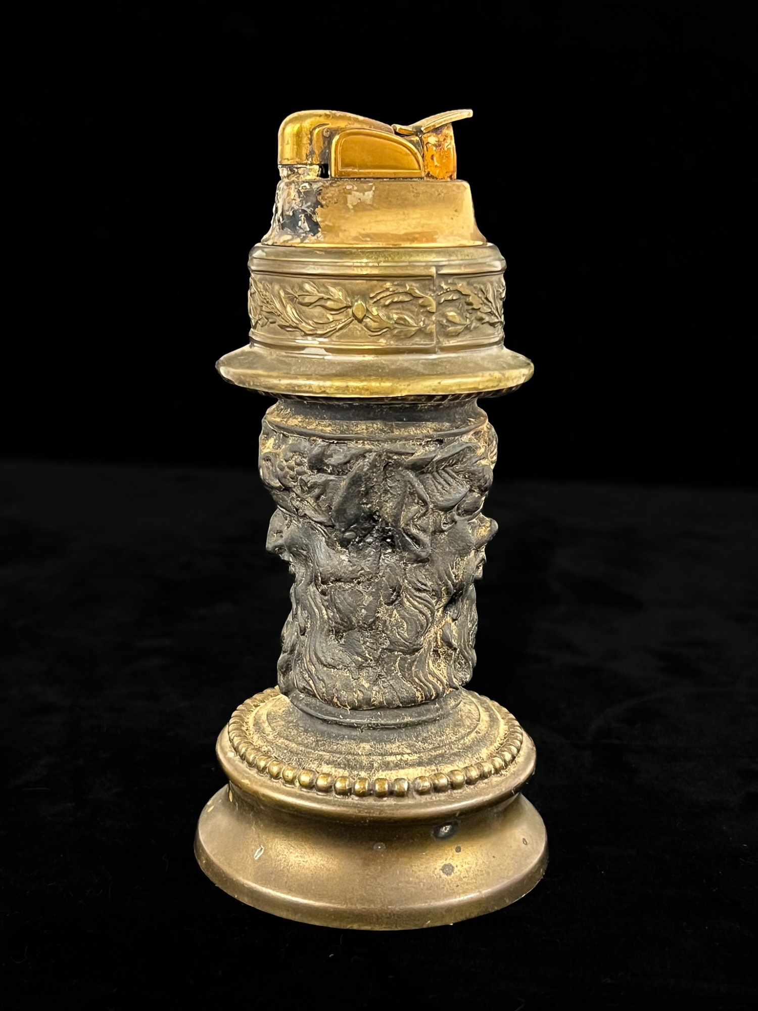VINTAGE METAL LIGHTER WITH MYTHOLOGICAL FACES #40073 | Auctionninja.com
