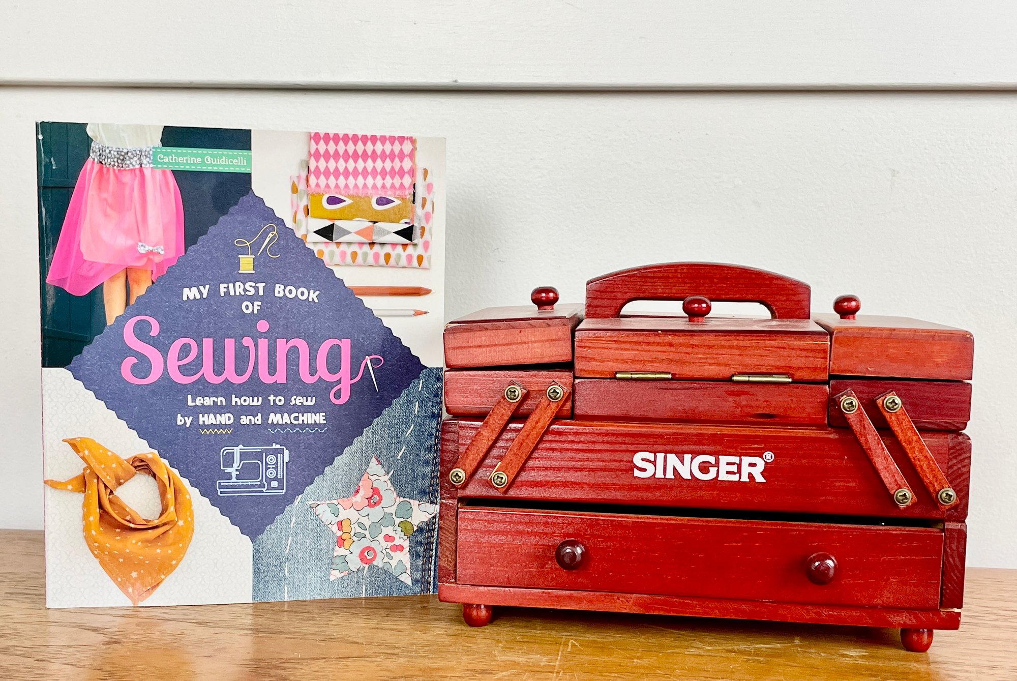 Small Singer Sewing Box And Kid's Sewing Book #16442 | Auctionninja.com
